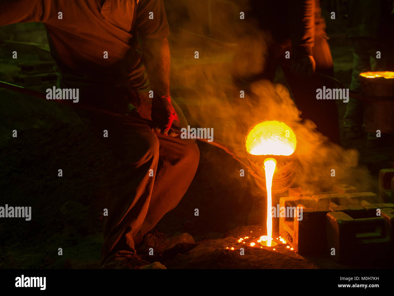 Steel Foundry Workplace with worker.Melting Iron.Industry concept Stock ...