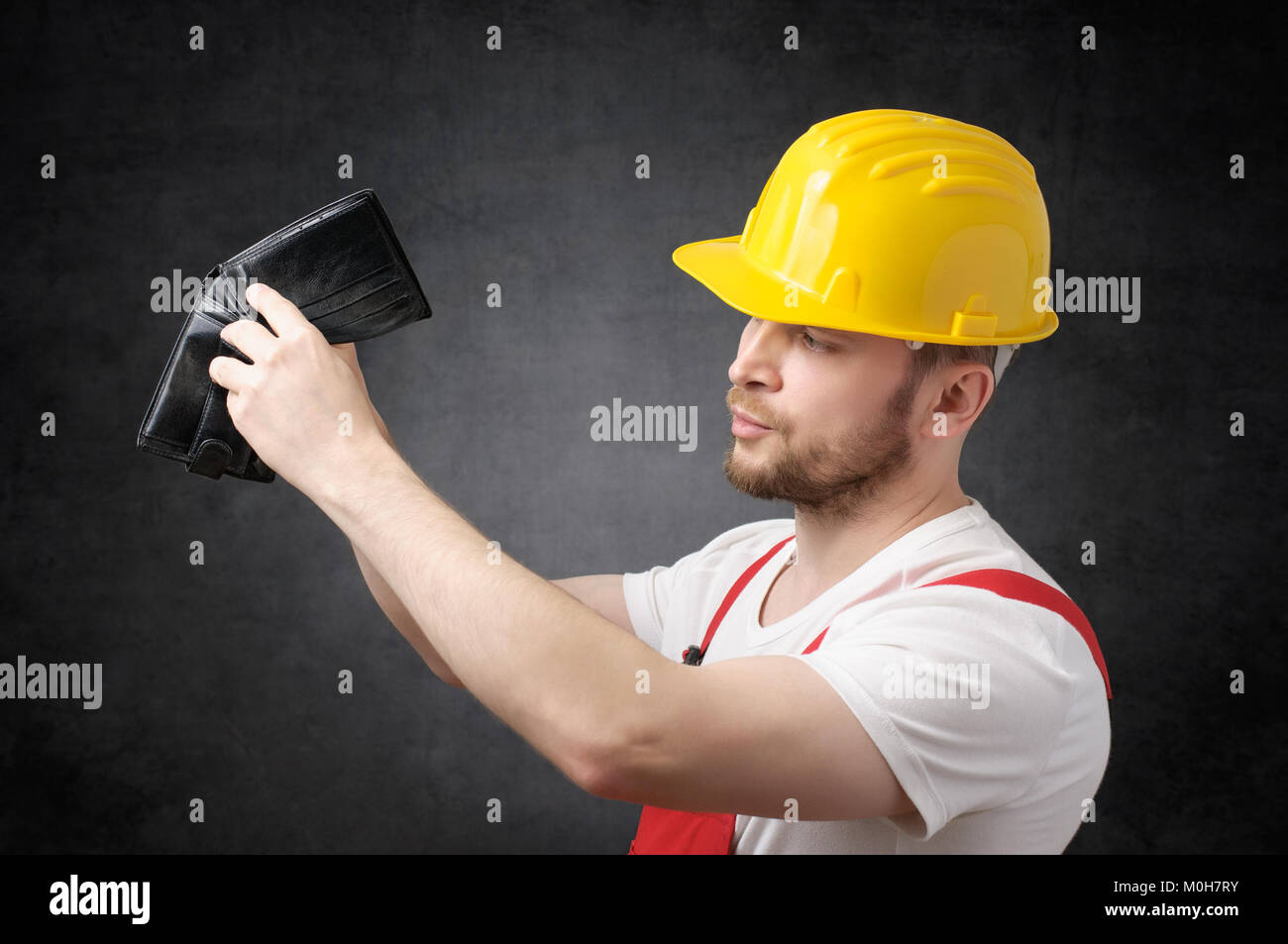 Poor construction worker Stock Photo - Alamy