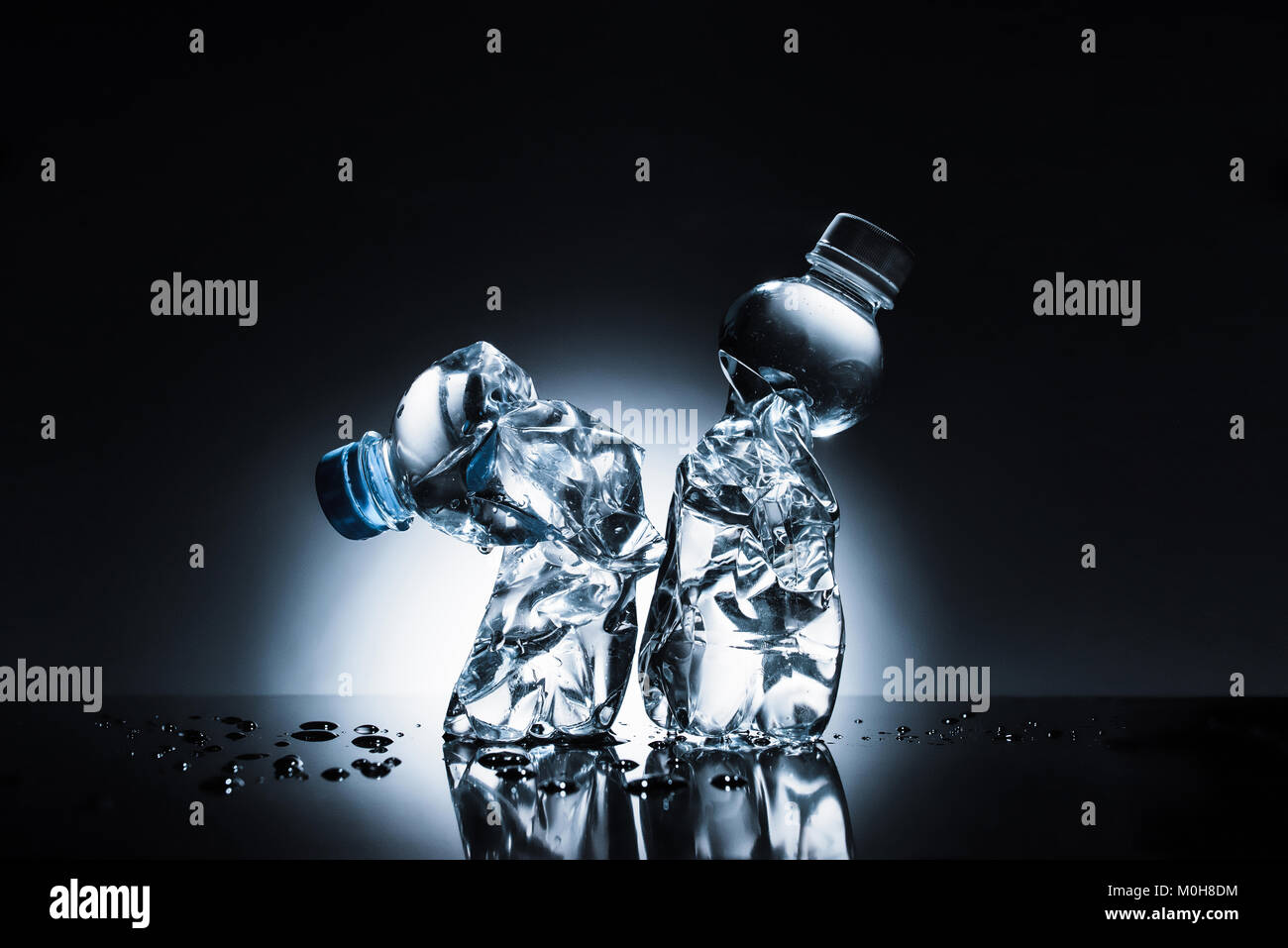 Crumpled plastic bottles hi-res stock photography and images - Alamy
