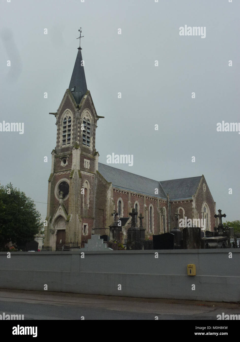 The church in Brêmes, located in the Pas-de-Calais region of France, is ...