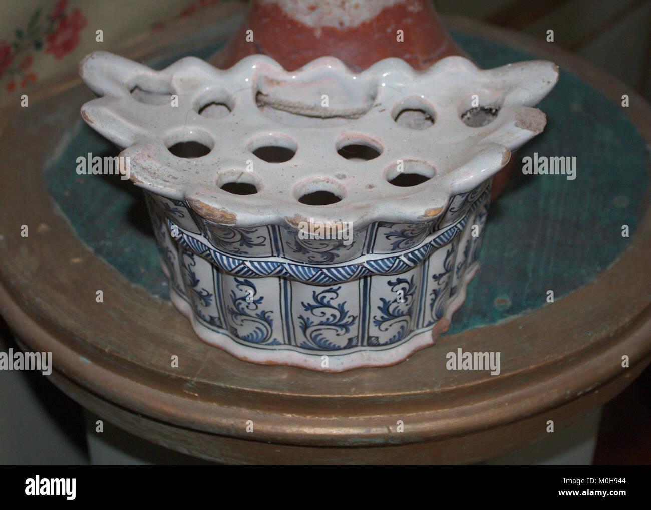 A historical bouquetière (flower holder), used for displaying flowers ...