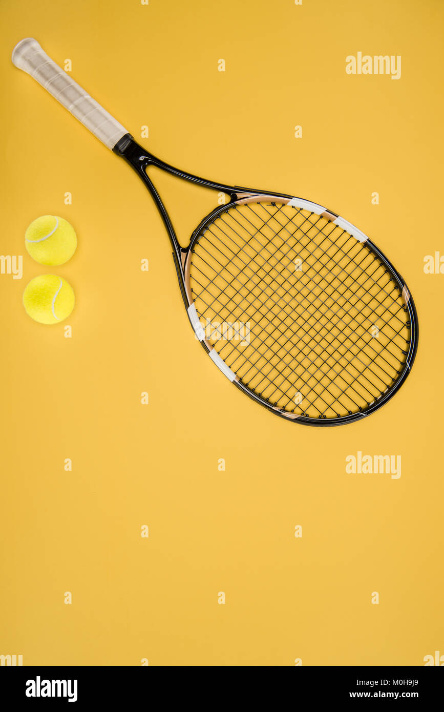 Tennis racket and yellow balls hi-res stock photography and images - Alamy