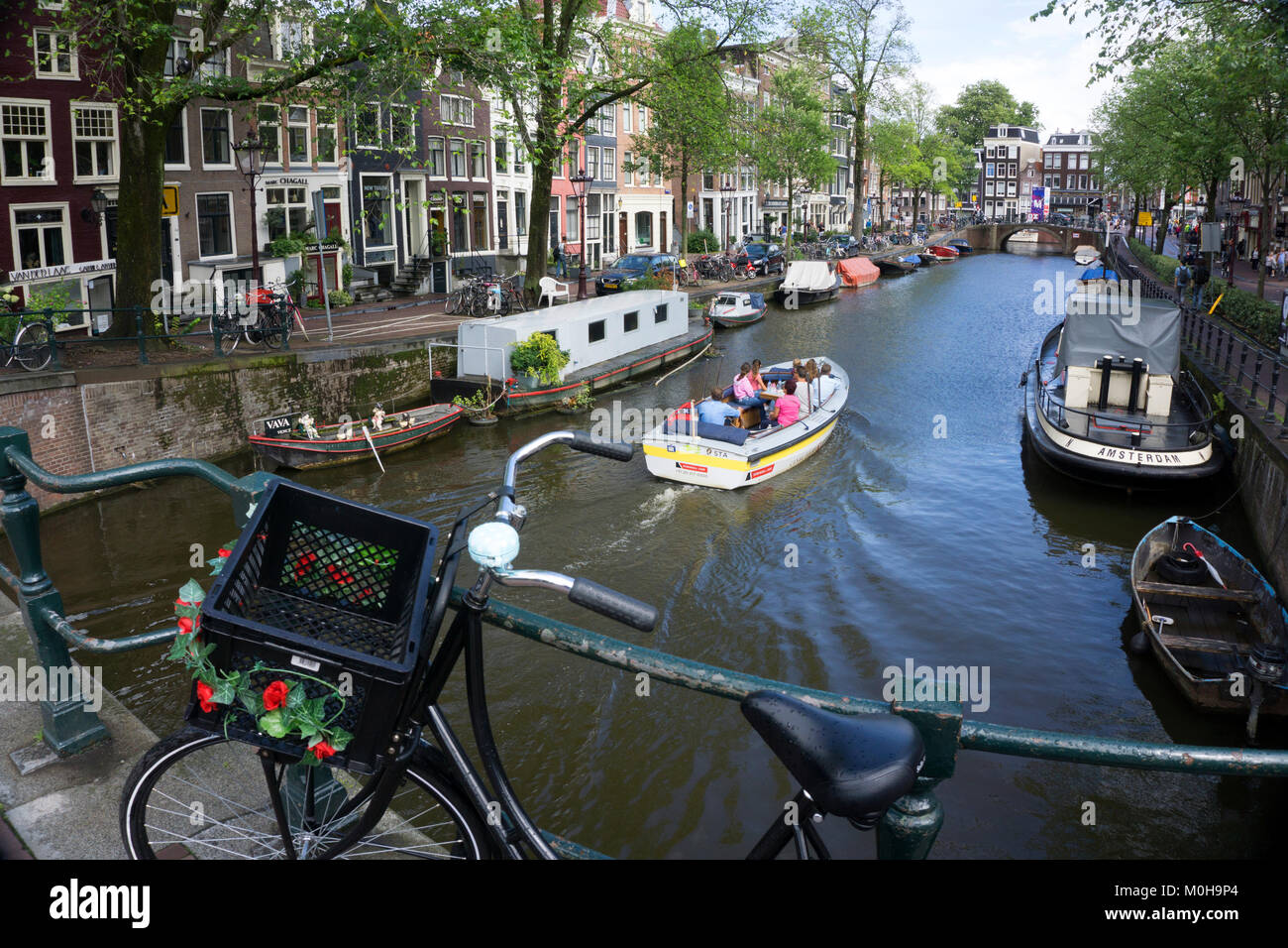 Amsterdam. The famous Canals and bridges of Old Amsterdam Stock Photo ...