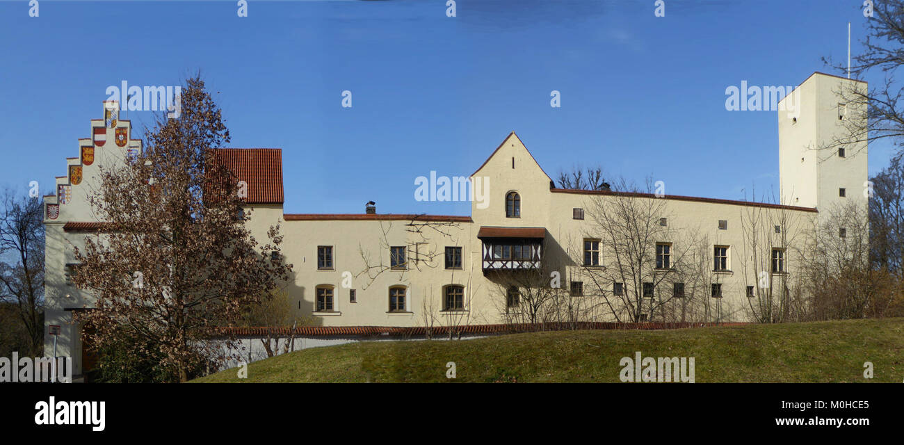 This image shows the eastern side of Burg Grünwald, a historic castle ...