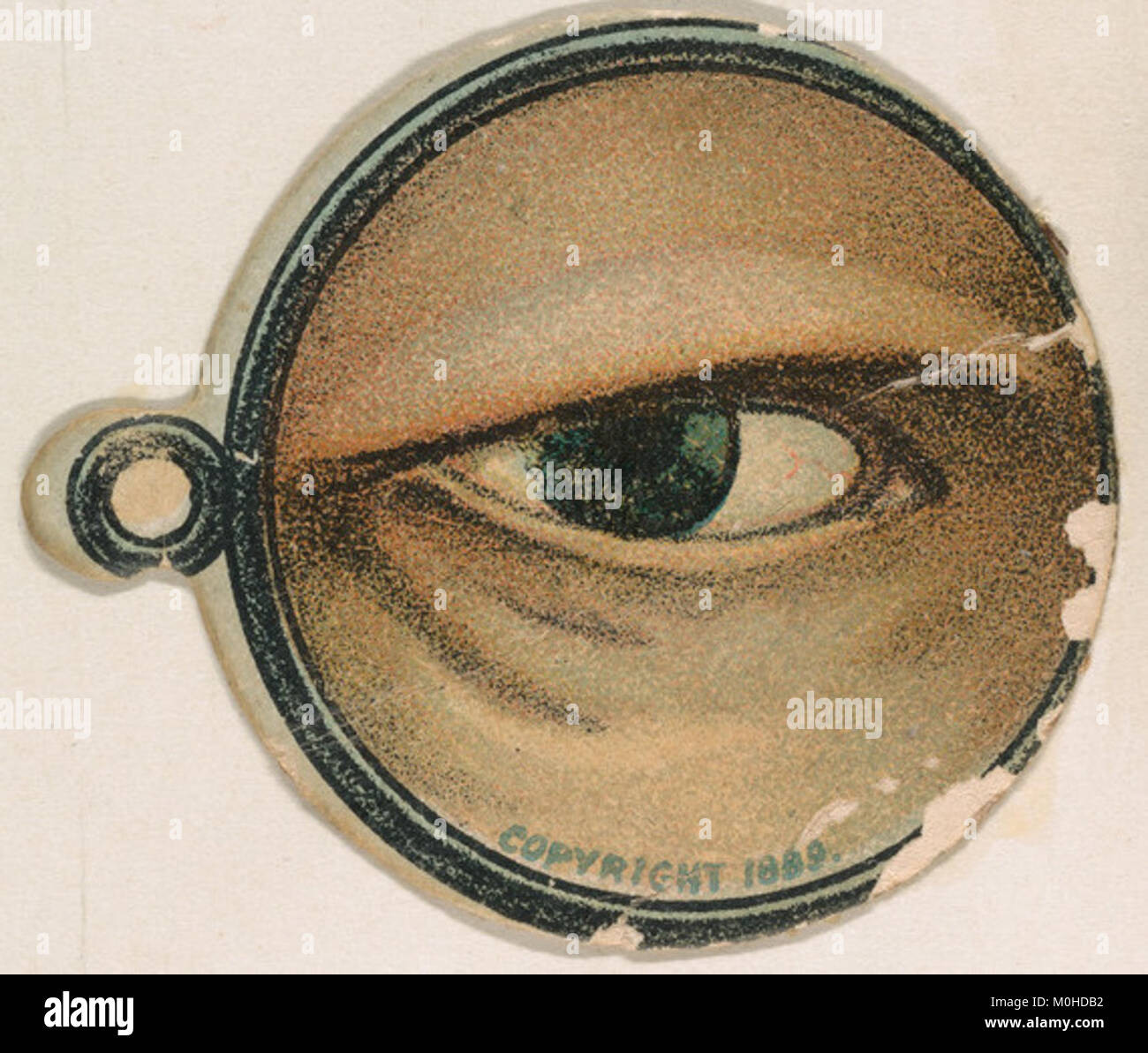 This image features a monocle and eye design from the *Jocular Ocular ...