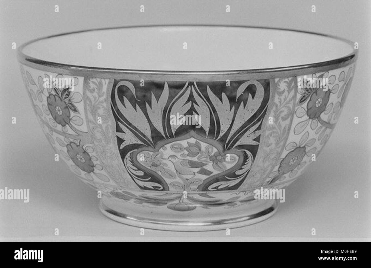 This bowl is part of a larger service and is displayed at the ...