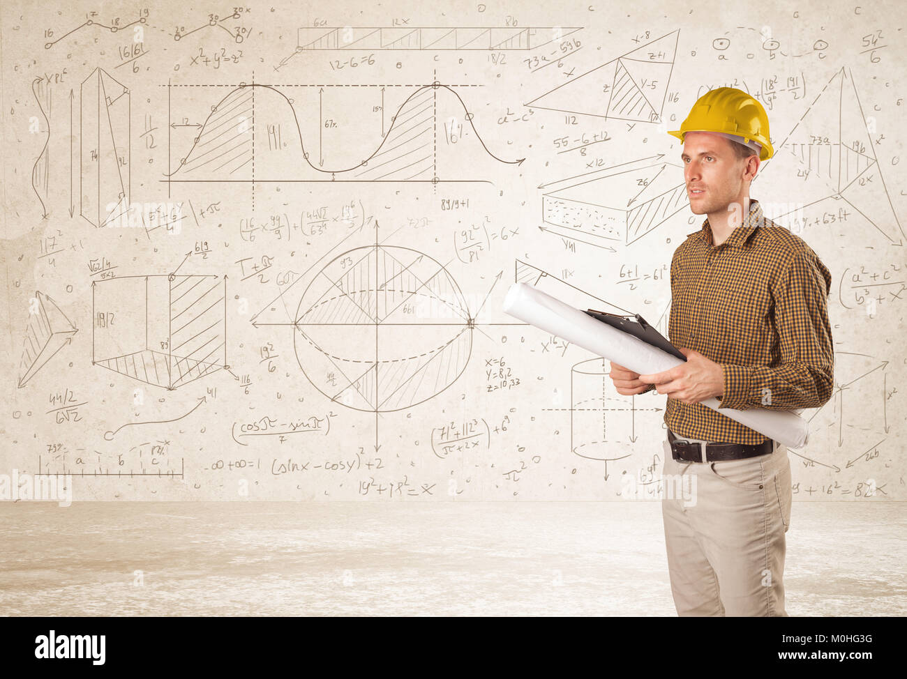 Handsome engineer calculating with hand drawn background concept Stock ...