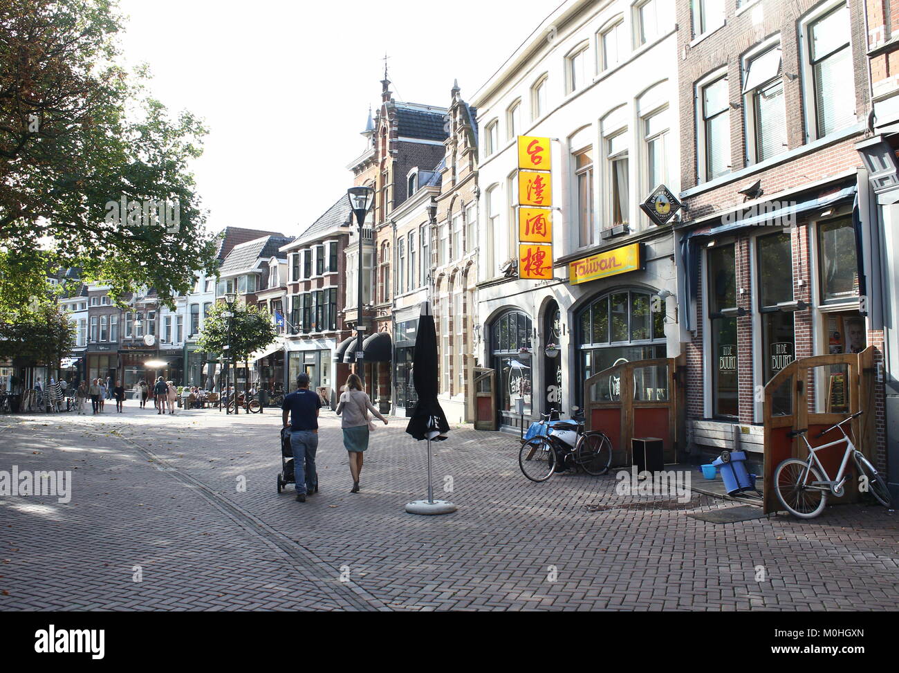 People walking on a square, old inner city of Zwolle, The Netherlands ...