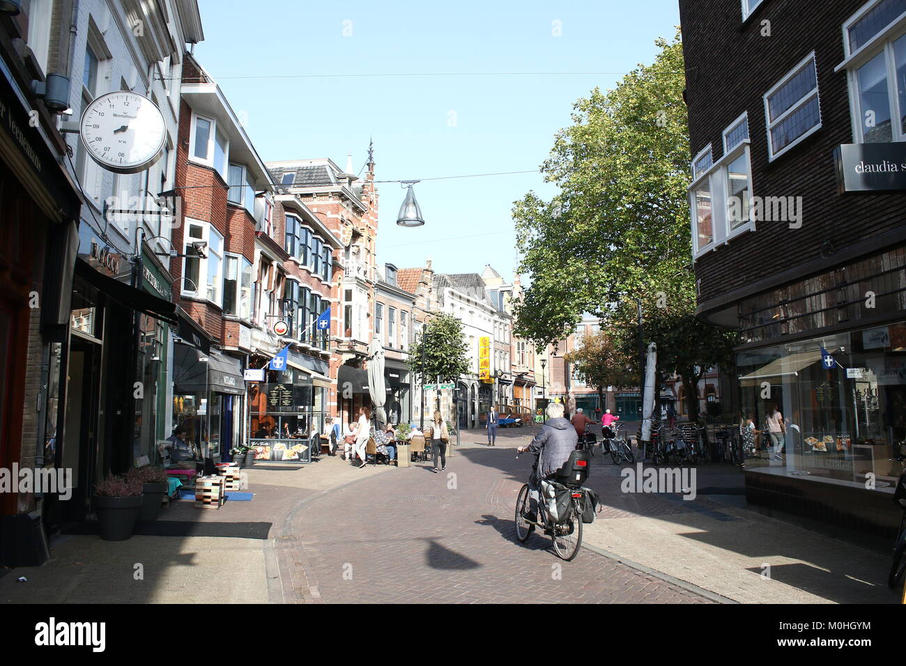 Shopping street, old inner city of Zwolle, The Netherlands. Woman ...