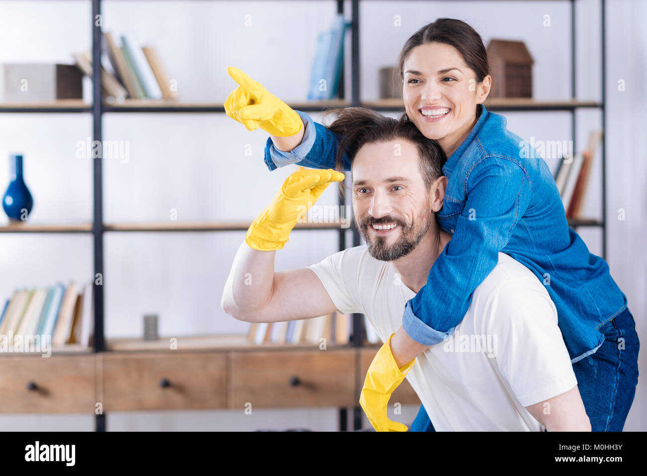 Energetic vigorous couple posing with smile Stock Photo - Alamy