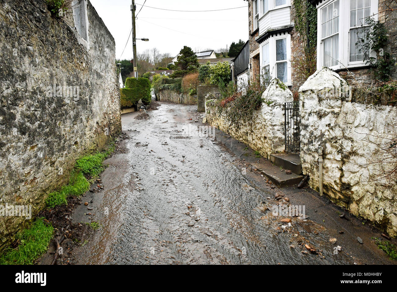 Debris and water cover the road on corner lane hi-res stock photography ...