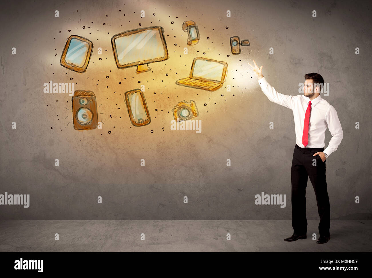 Man throwing hand drawn electronical devices concept Stock Photo - Alamy