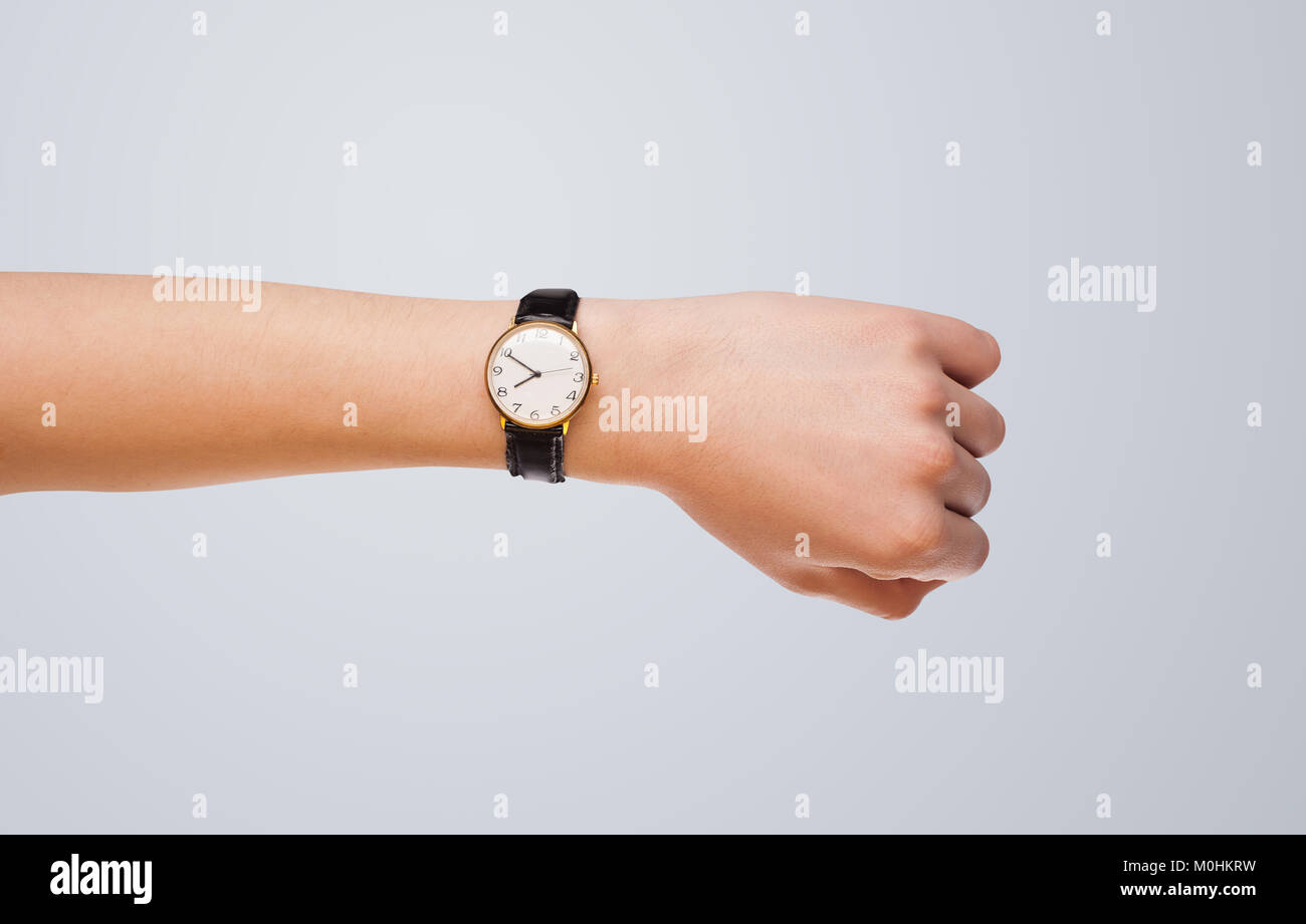 Hand with modern watch showing precise time Stock Photo - Alamy