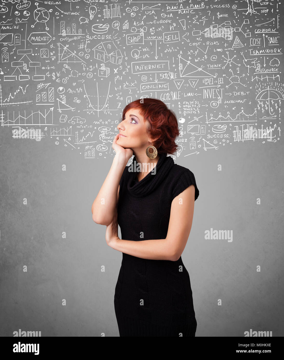 Young pretty lady with hand drawn white calculations and icons Stock ...