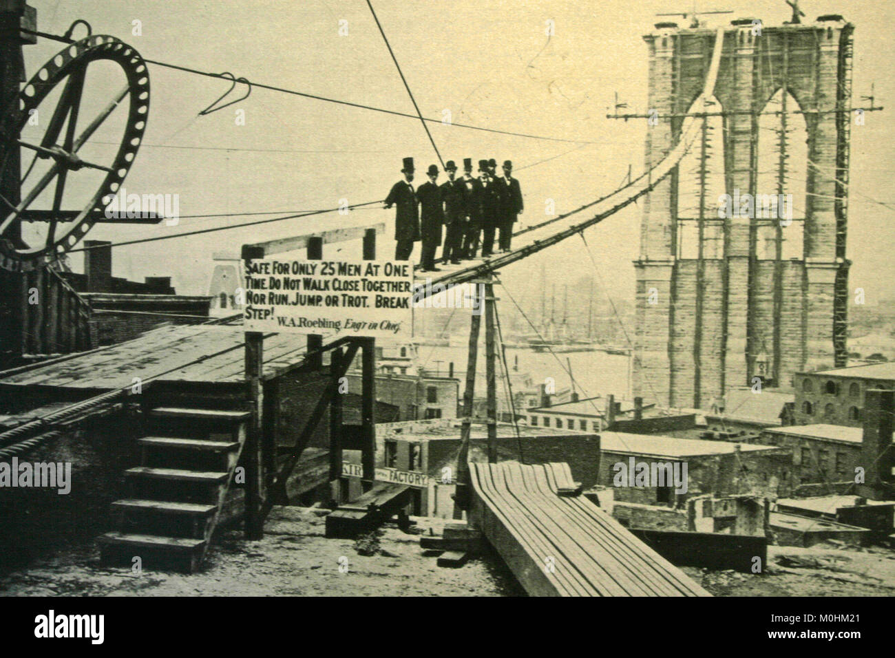 Early construction of the Brooklyn Bridge with a precautionary notice ...