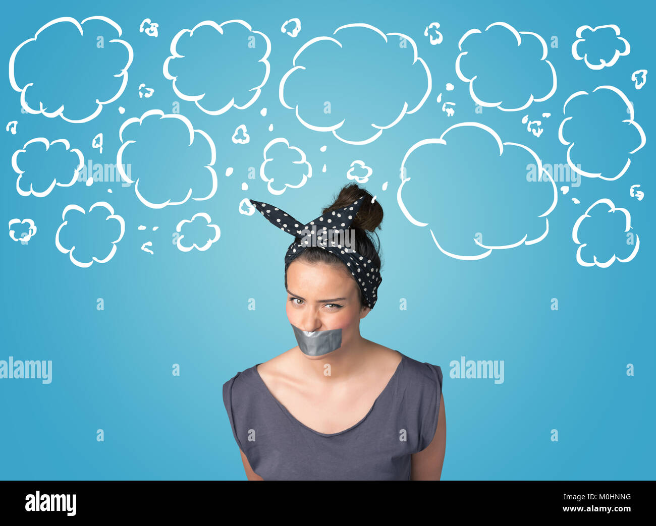 Funny person with taped mouth and hand drawn clouds around head Stock ...