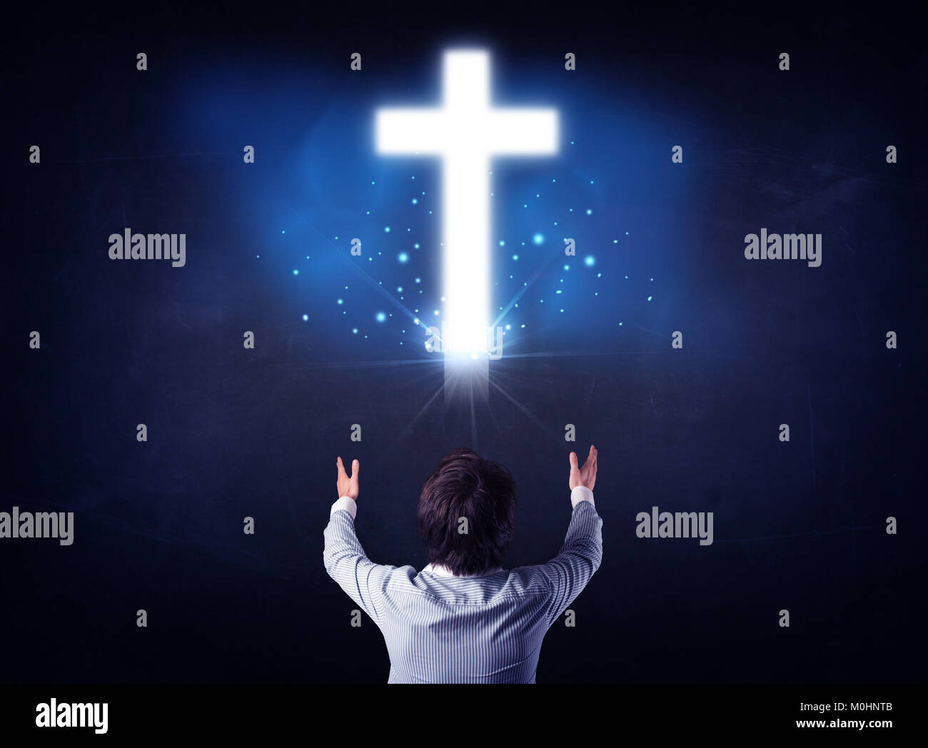 Standing looking at cross jesus hi-res stock photography and images - Alamy