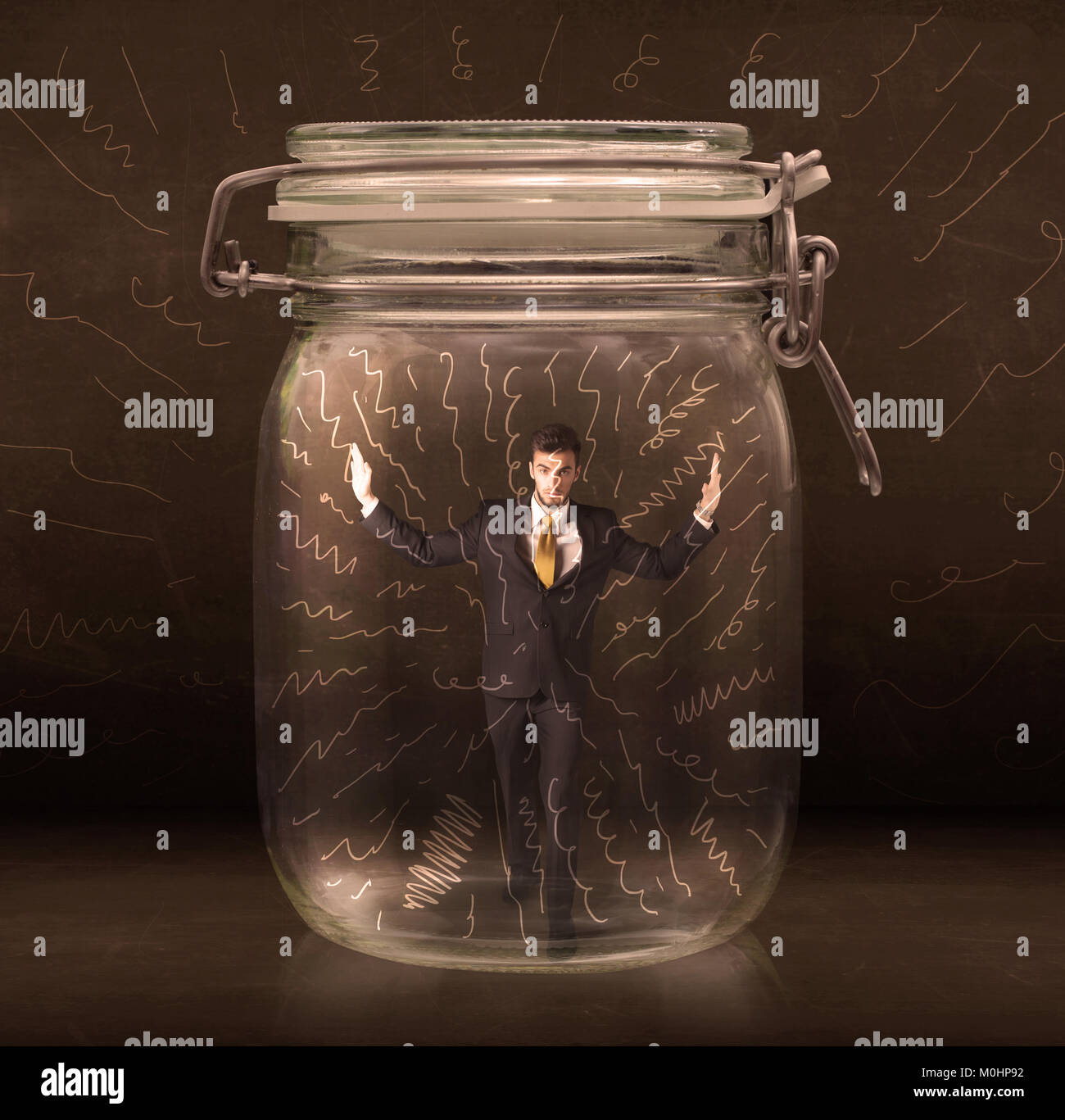 Businessman inside a jar with powerful hand drawn lines concept on ...