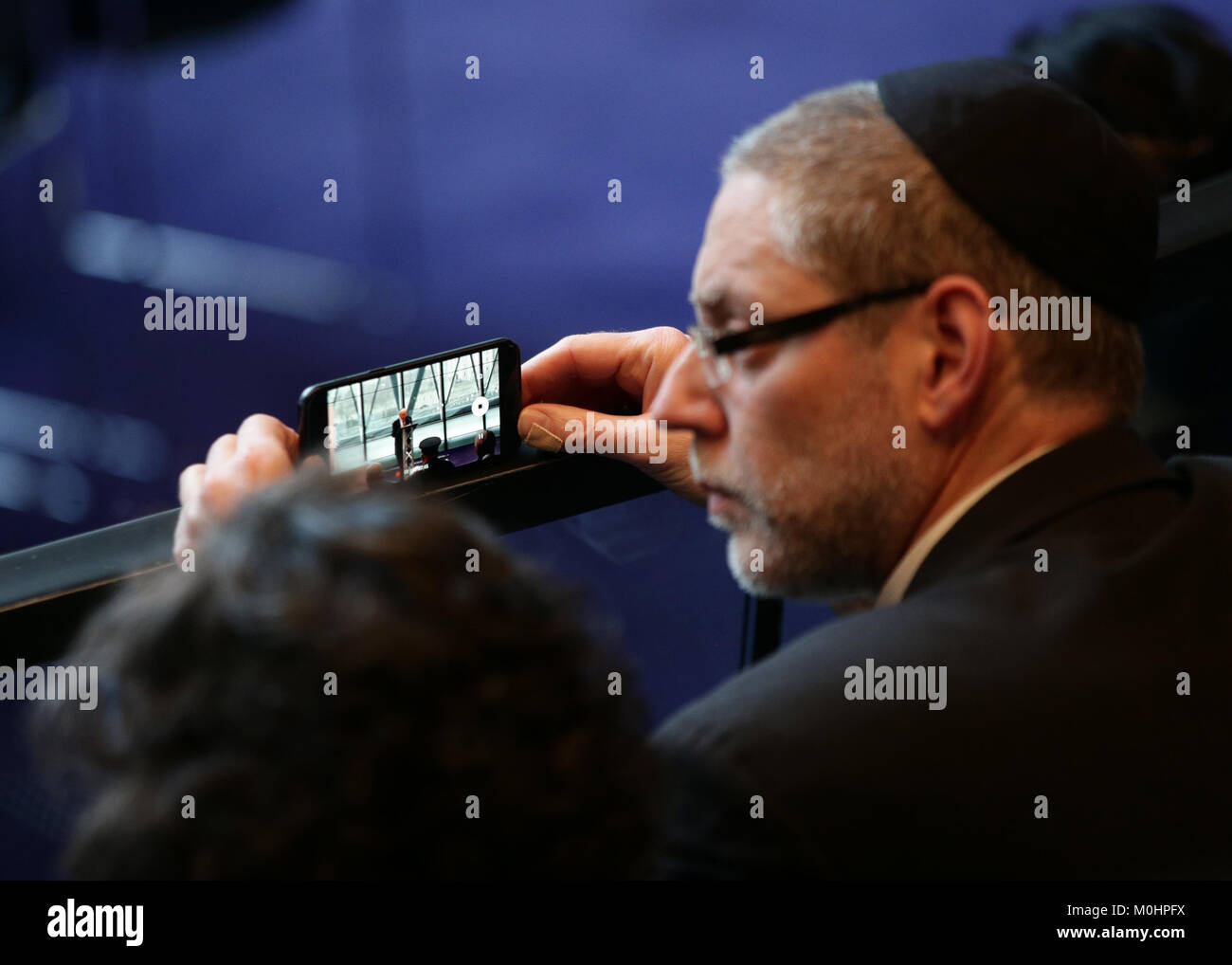 A guest recording a testimonial on his mobile phone given by Holocaust ...