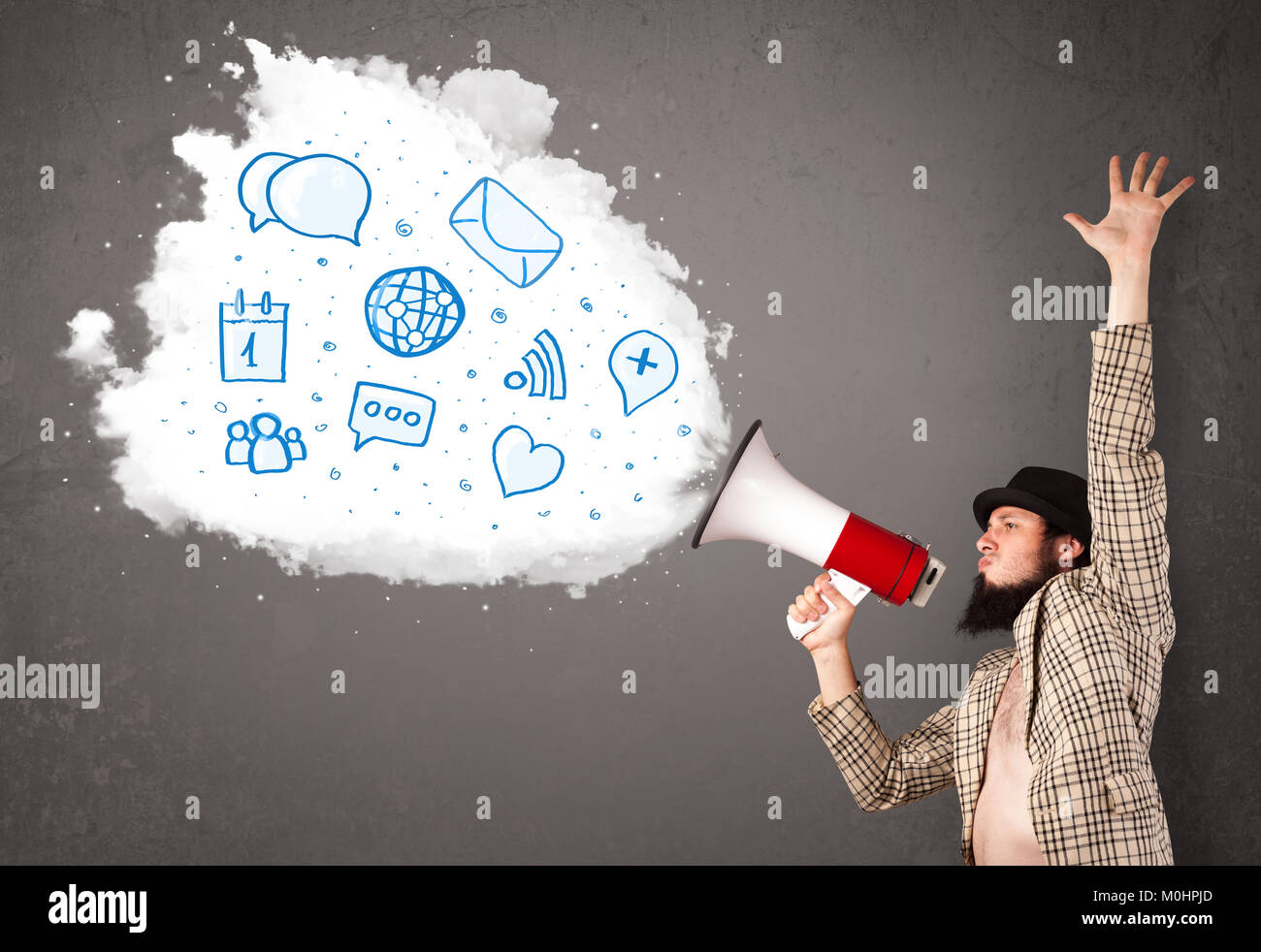 Young man shouting into loudspeaker and modern blue icons and symbols ...
