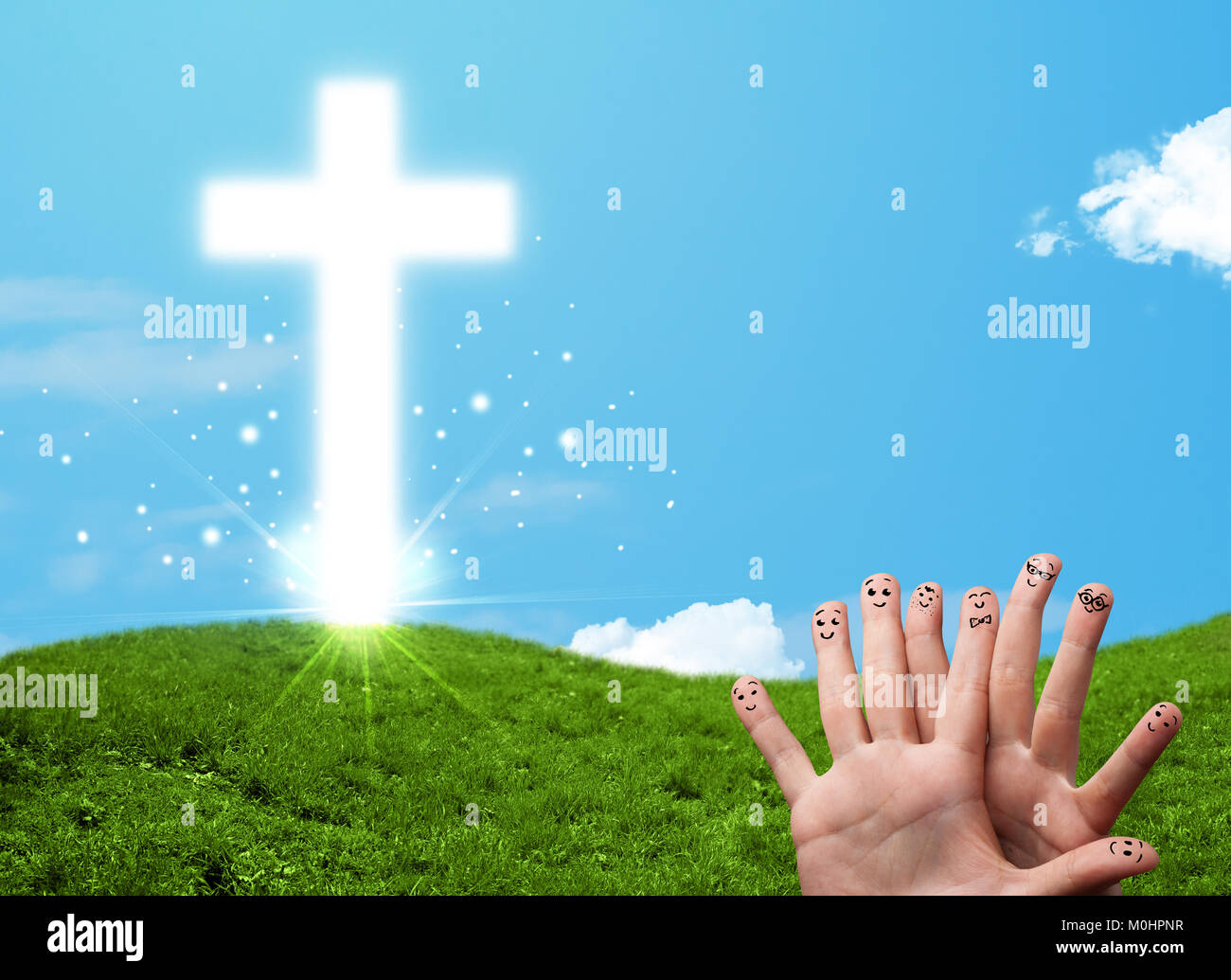 Happy finger smiley faces on hand with christian religion cross Stock ...