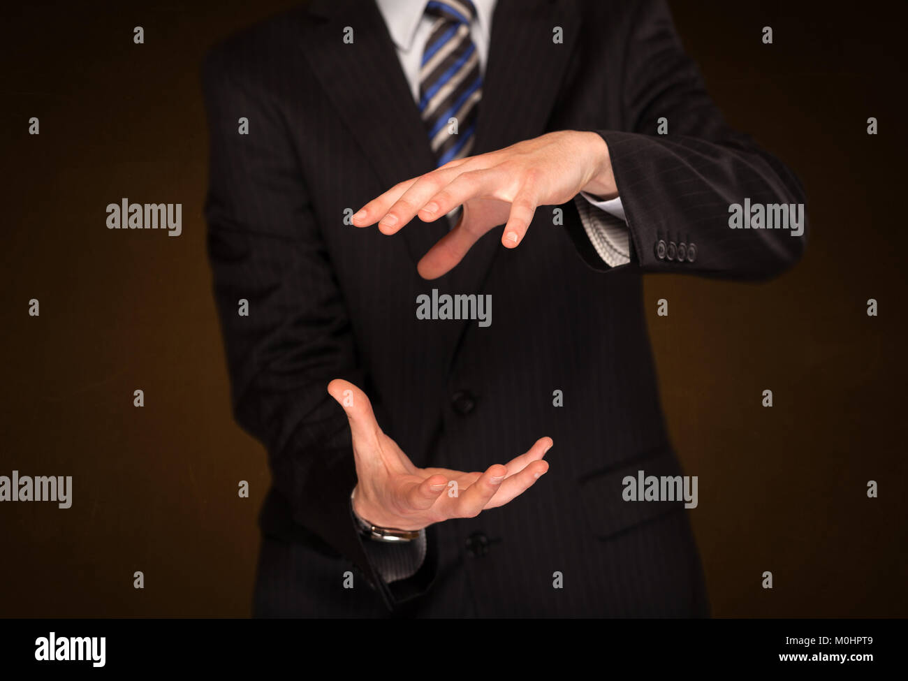 Man carrying something in hand hi-res stock photography and images - Alamy