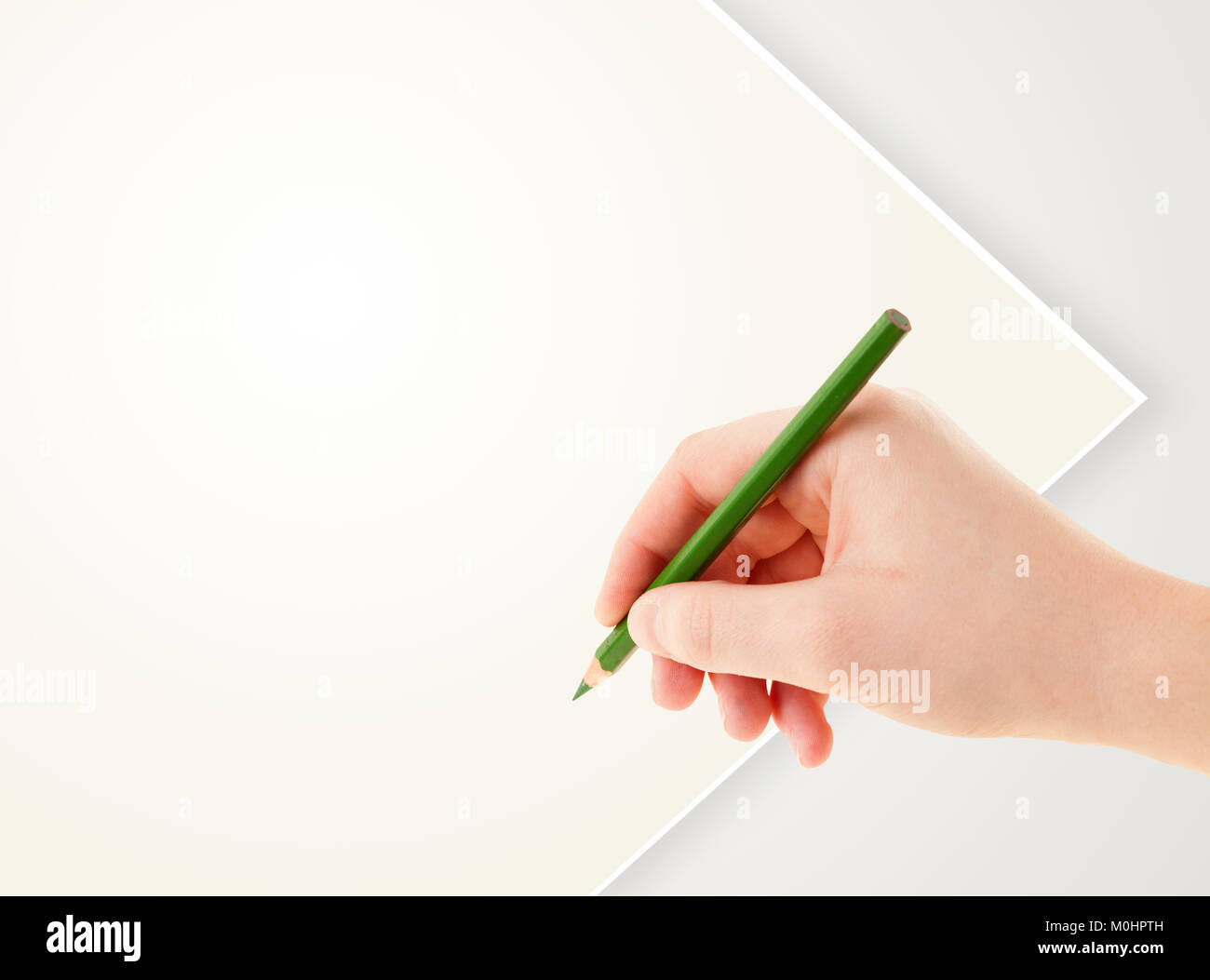 Human hand drawing with pencil on empty white paper template Stock ...