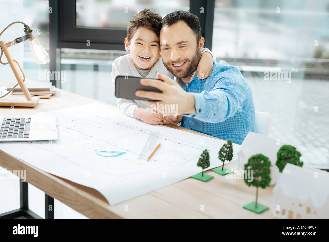 Father and son in office hi-res stock photography and images - Alamy