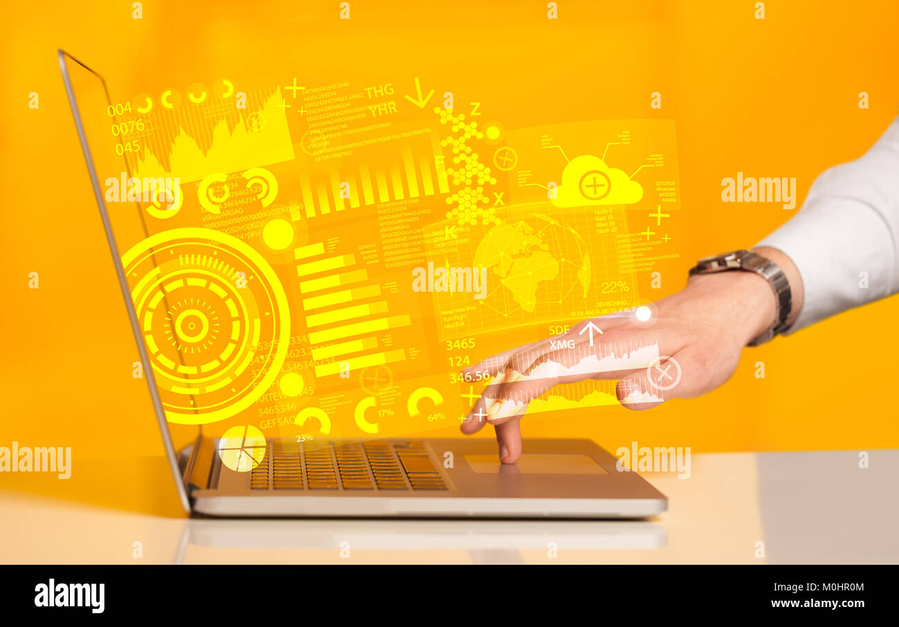 Modern notebook computer with future technology media symbols Stock ...