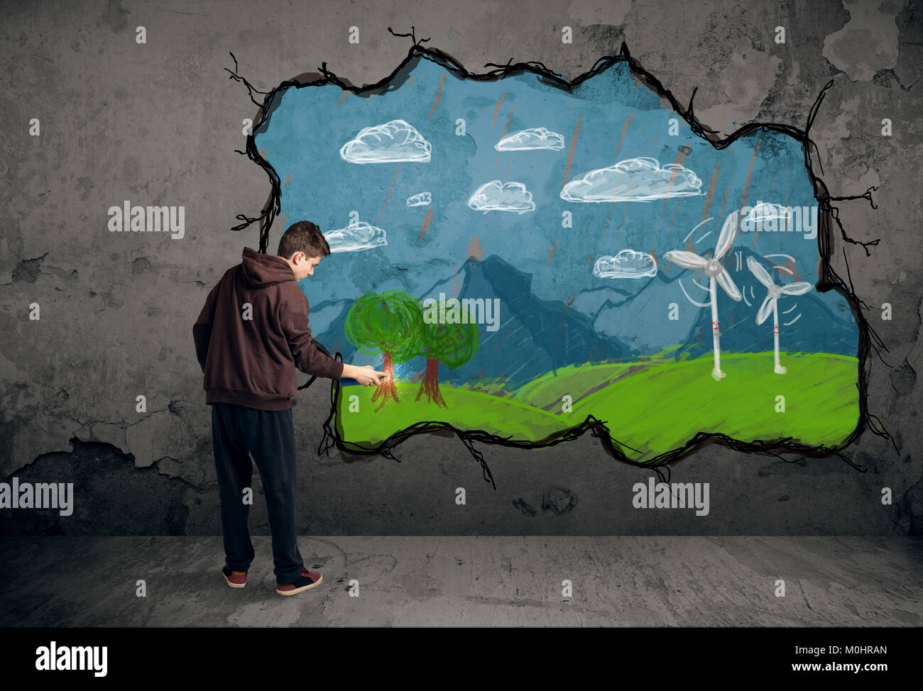 Young urban painter drawing colorful future image on the wall Stock ...