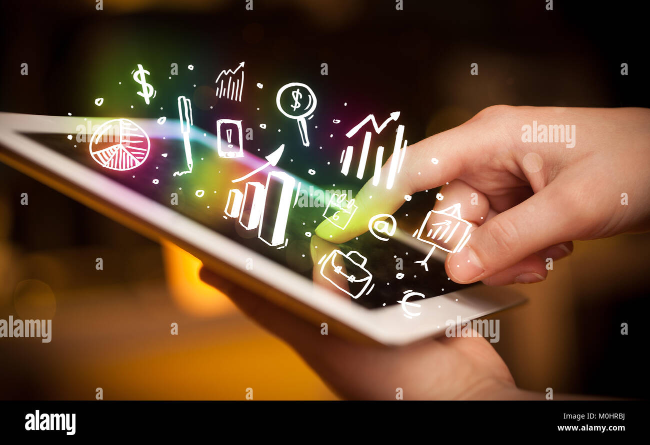 Finger pointing on tablet pc, charts concept Stock Photo - Alamy