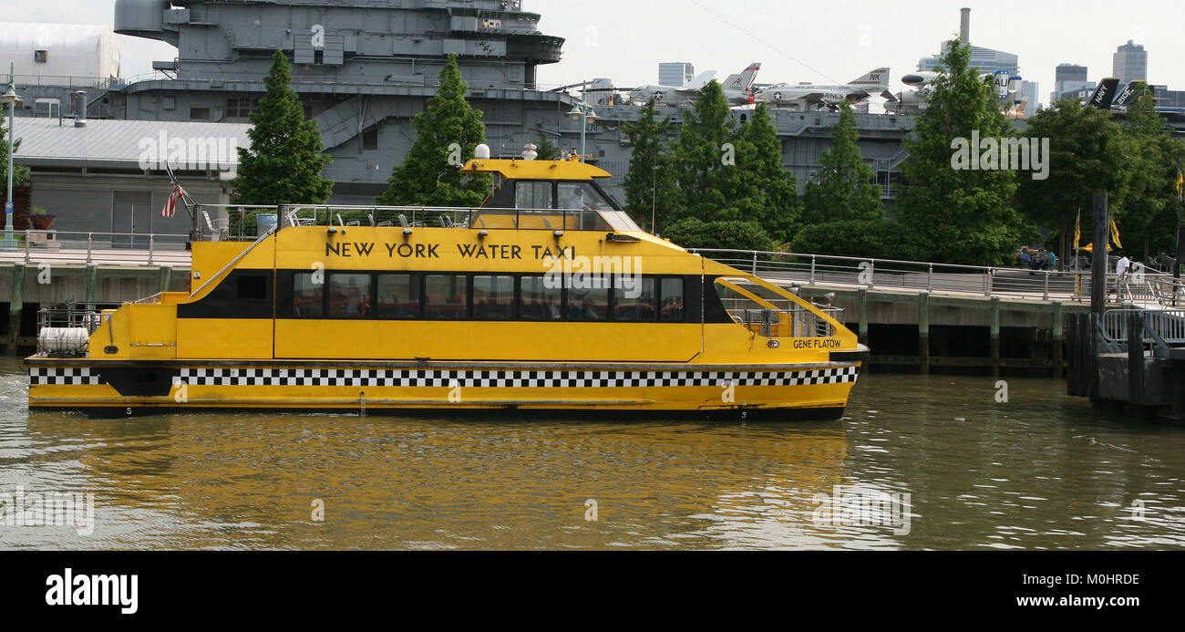 The Intrepid battleship and the New York Water Taxi (NYWT), at the ...
