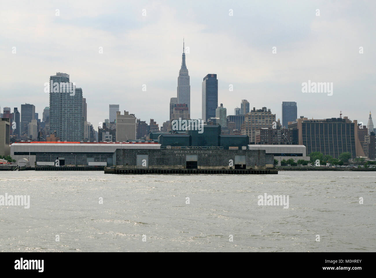 The Department of Marine & Aviation Pier 76 with Midtown Manhattan in ...