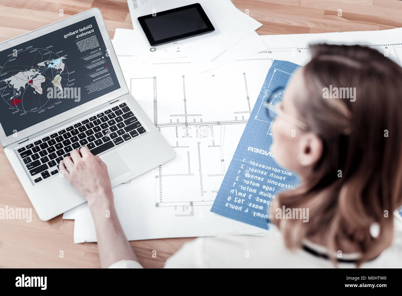 Top view picture of working process at the table Stock Photo - Alamy