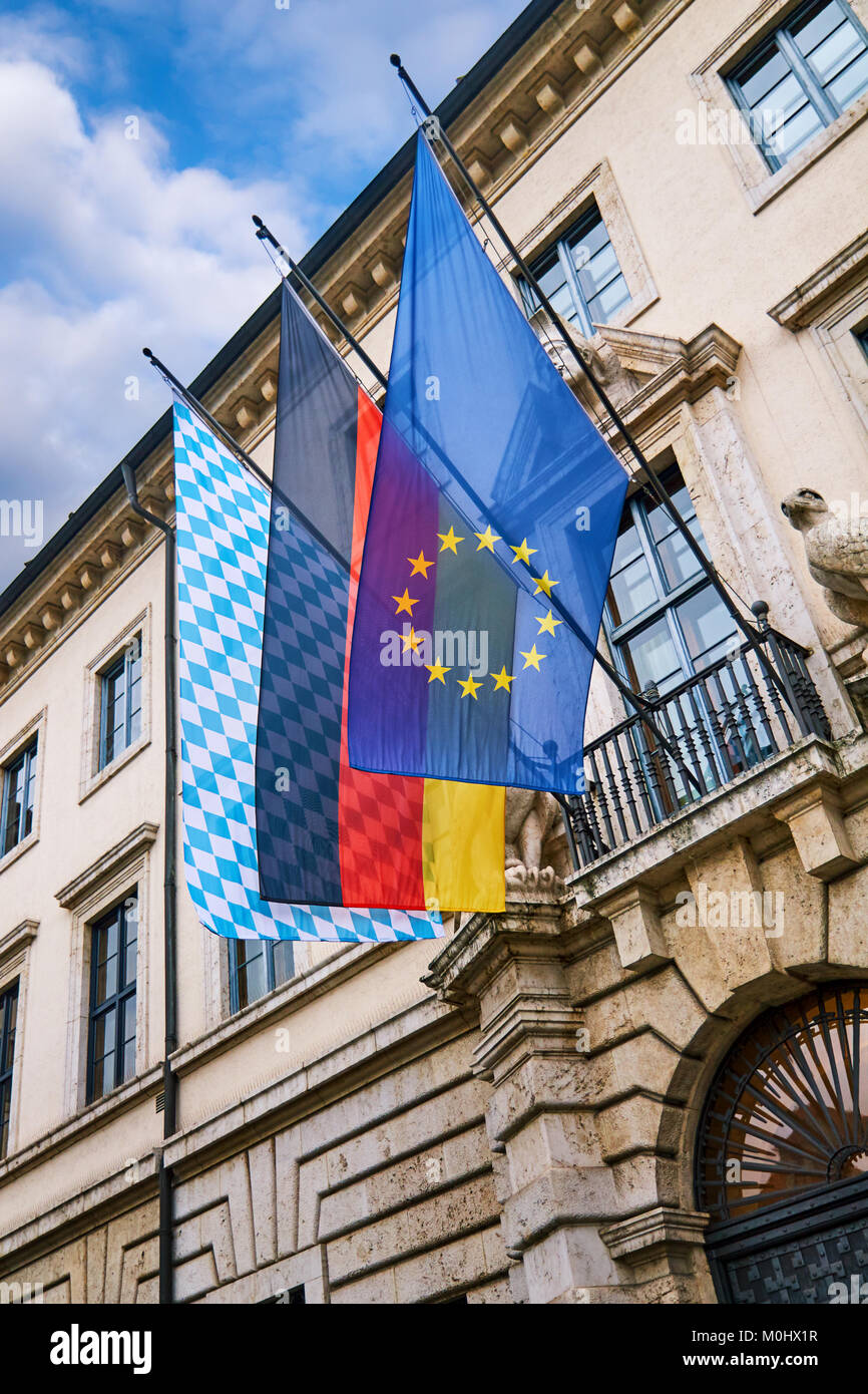 European Union, German and Bavarian flag on a building Stock Photo - Alamy