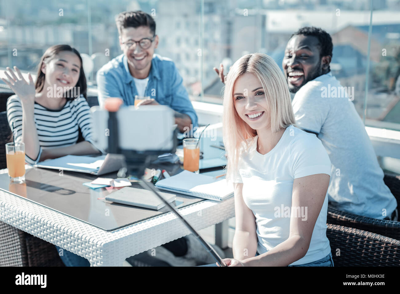 Best mates laughing while posing for selfie Stock Photo - Alamy