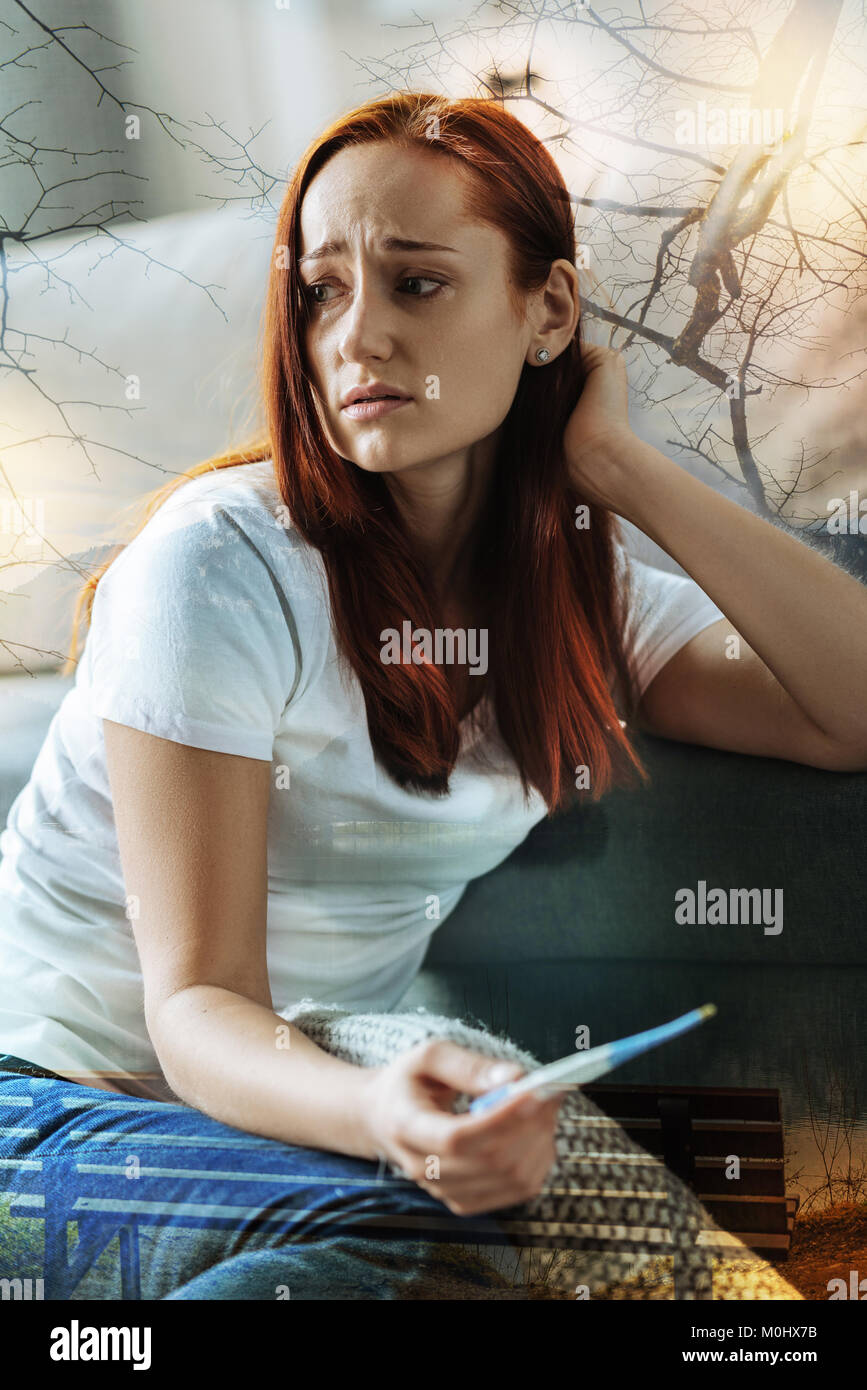 Woman and pregnancy test and crying hi-res stock photography and images ...