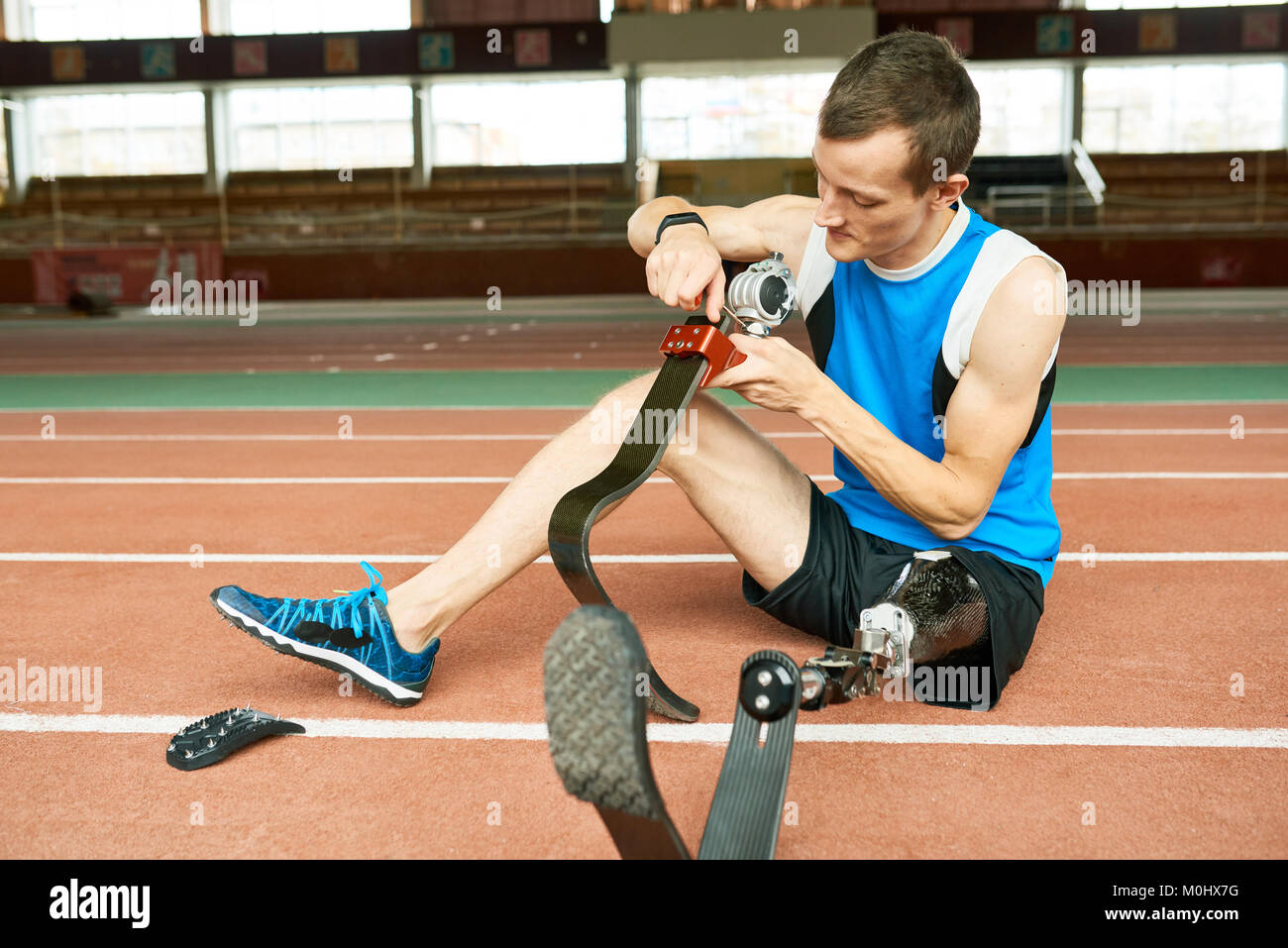 Handicapped Sportsman Fixing Prosthetic Foot Stock Photo - Alamy