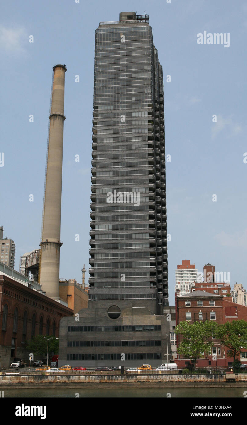 Tall black apartment skyscraper building next to the Con Edison East ...