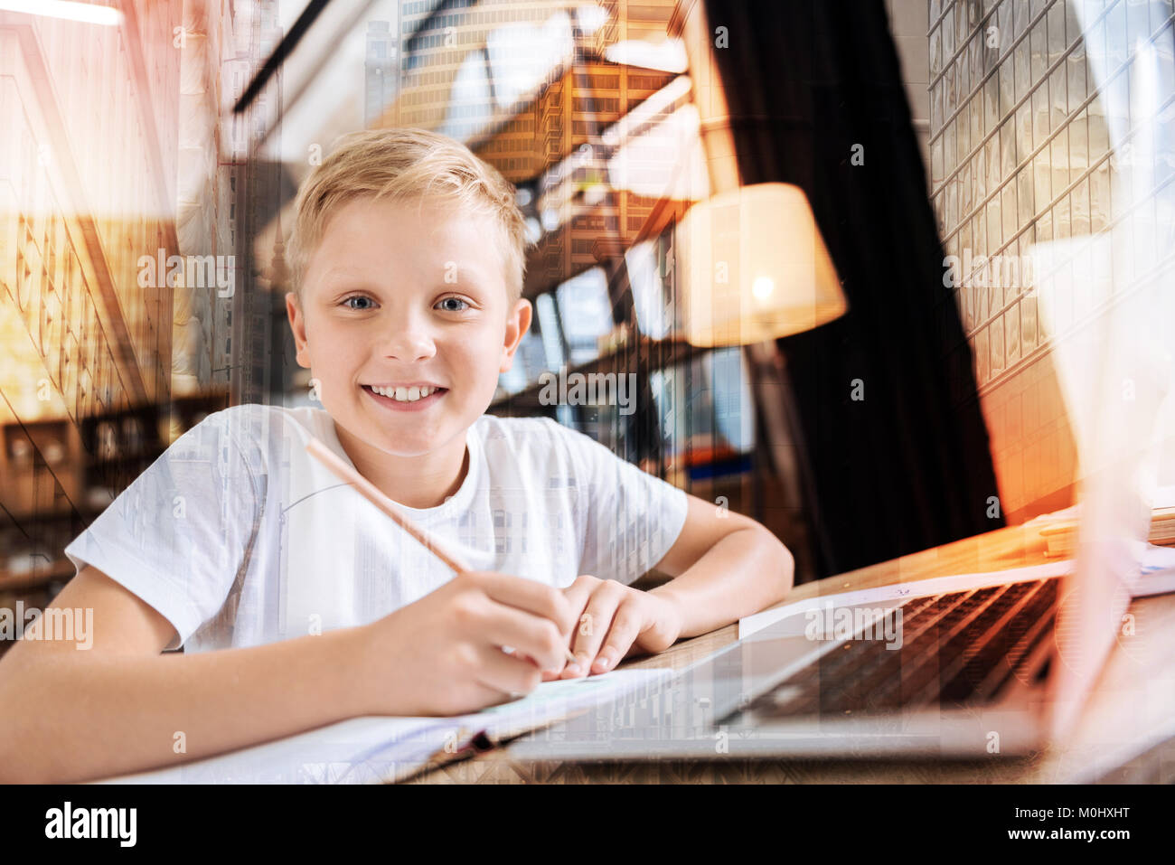 Pupil boy making notes hi-res stock photography and images - Alamy