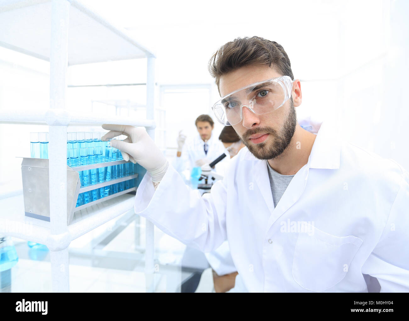 Side view concentrated scientists hi-res stock photography and images ...