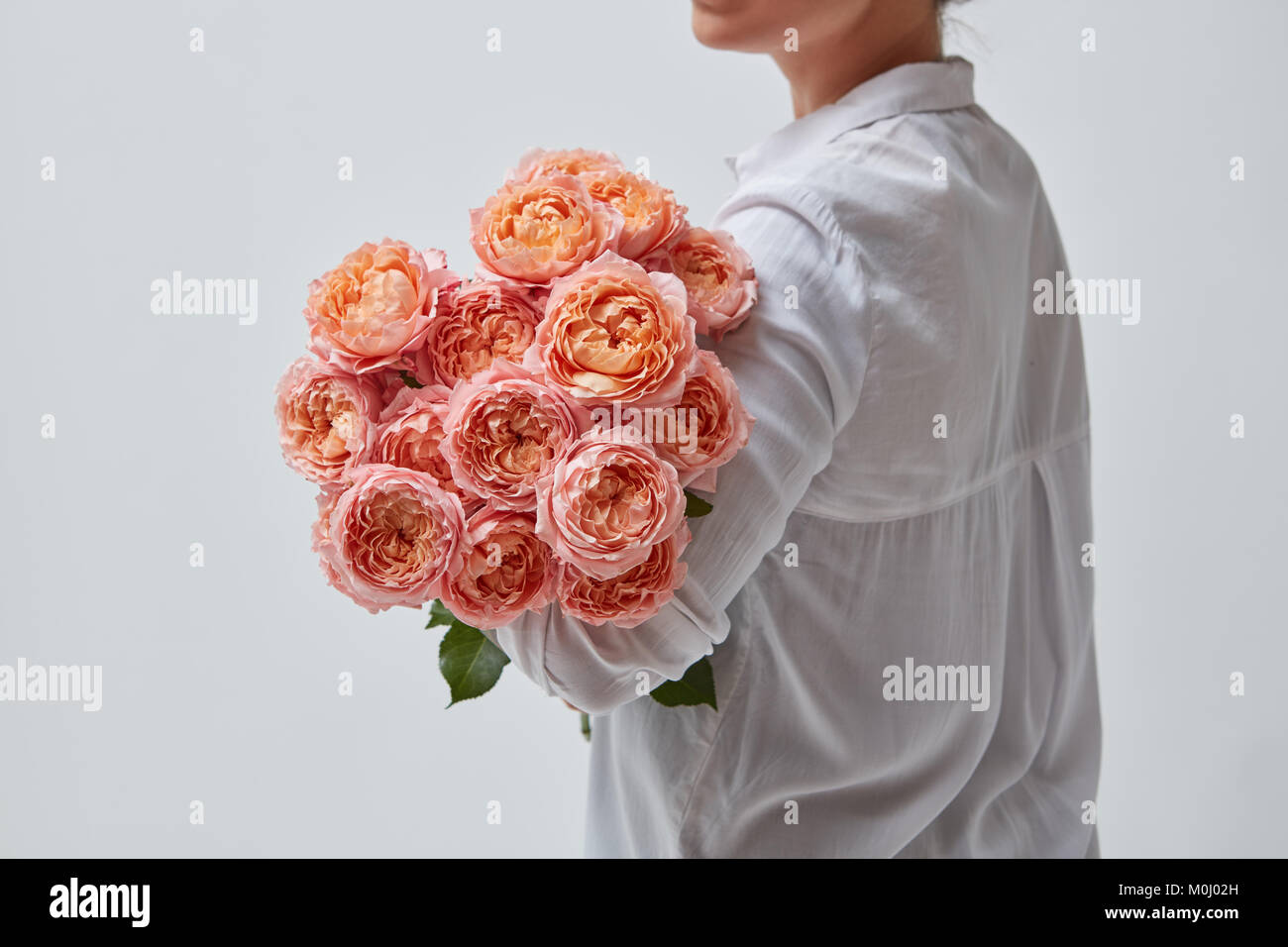 Woman giving bouquet flowers mother hi-res stock photography and images ...
