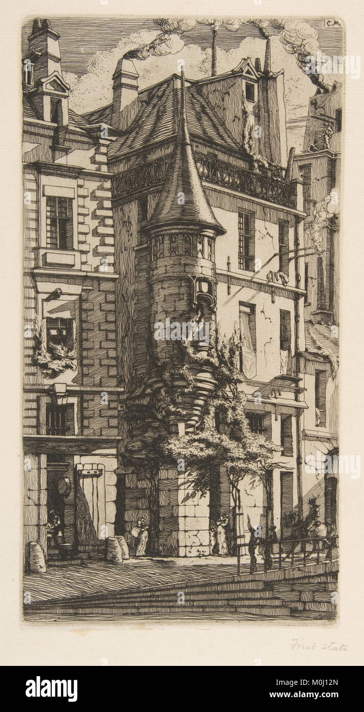 A historic house with a turret on Rue de la Tixéranderie in Paris ...