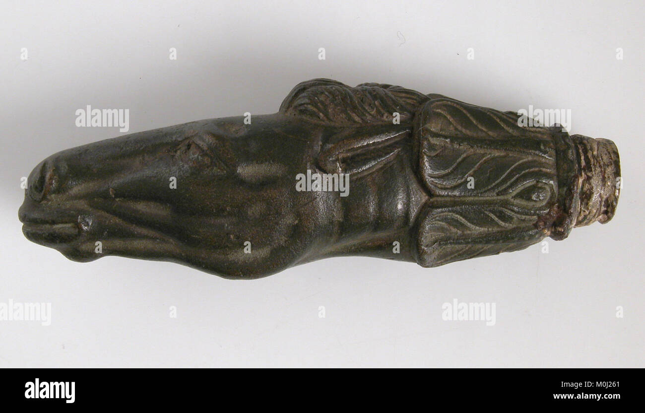 This key handle, shaped like a horse's head, is part of the collection ...