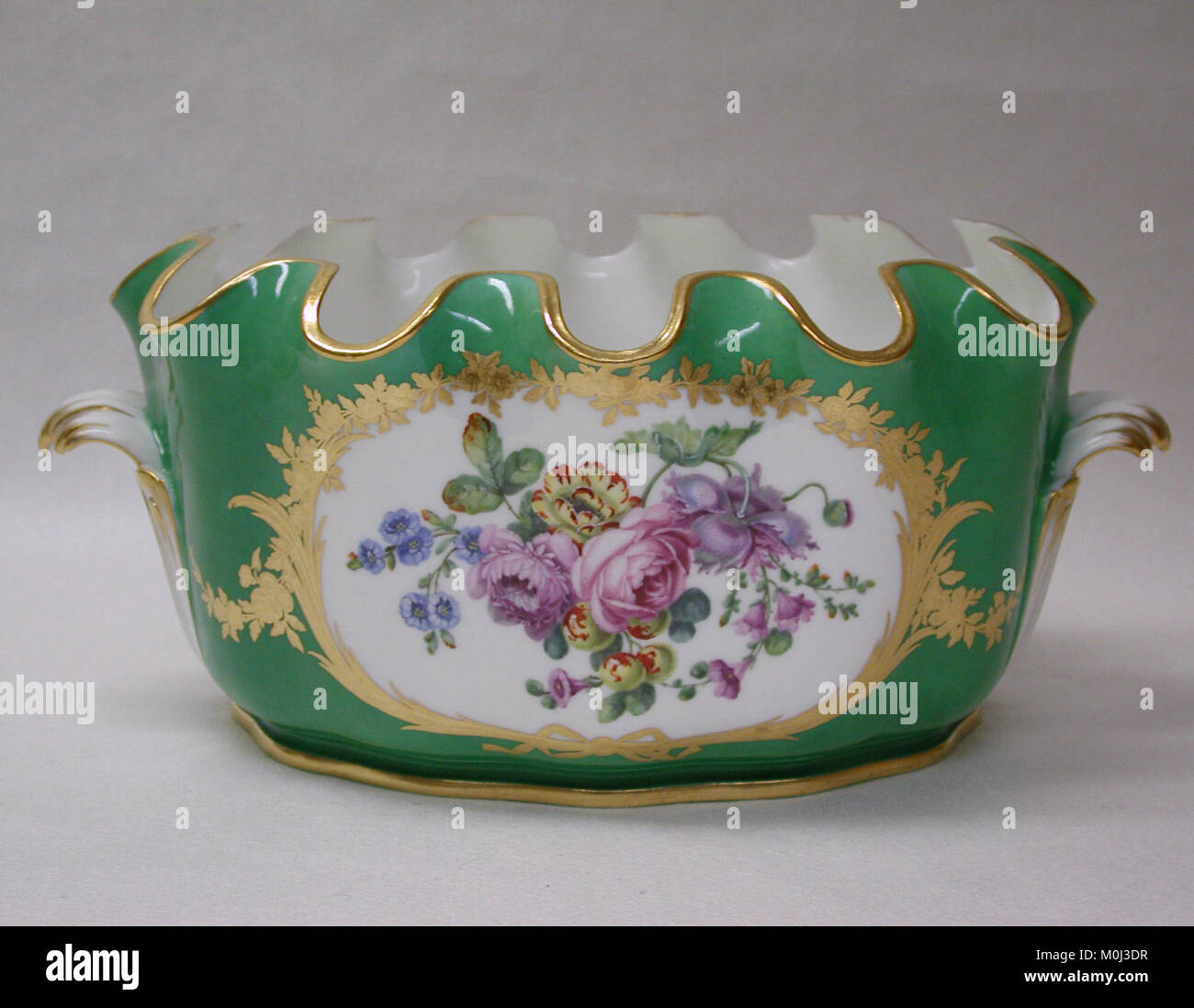 This image features a Monteith, a type of decorative bowl or container ...