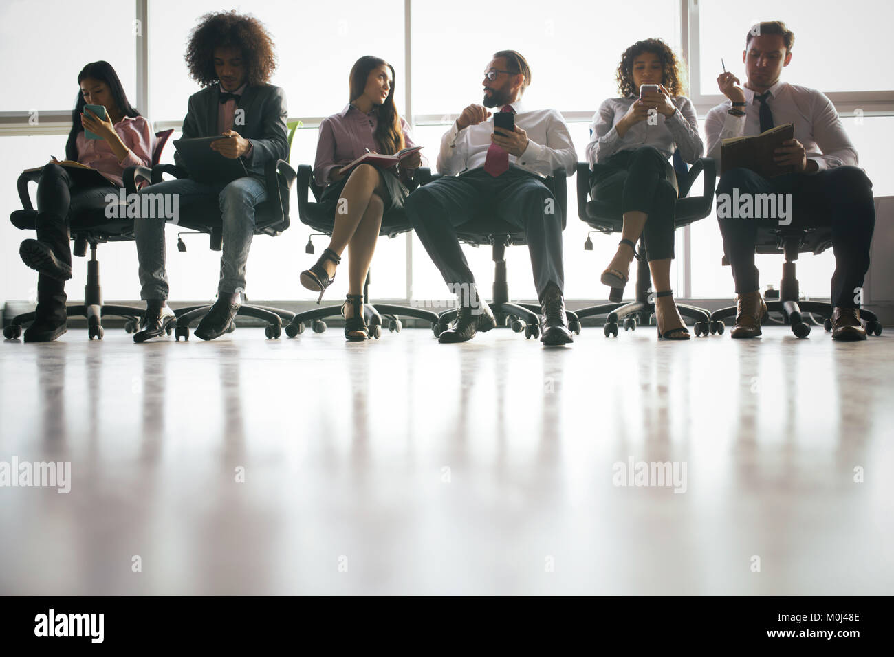 Busy office environment Stock Photo - Alamy