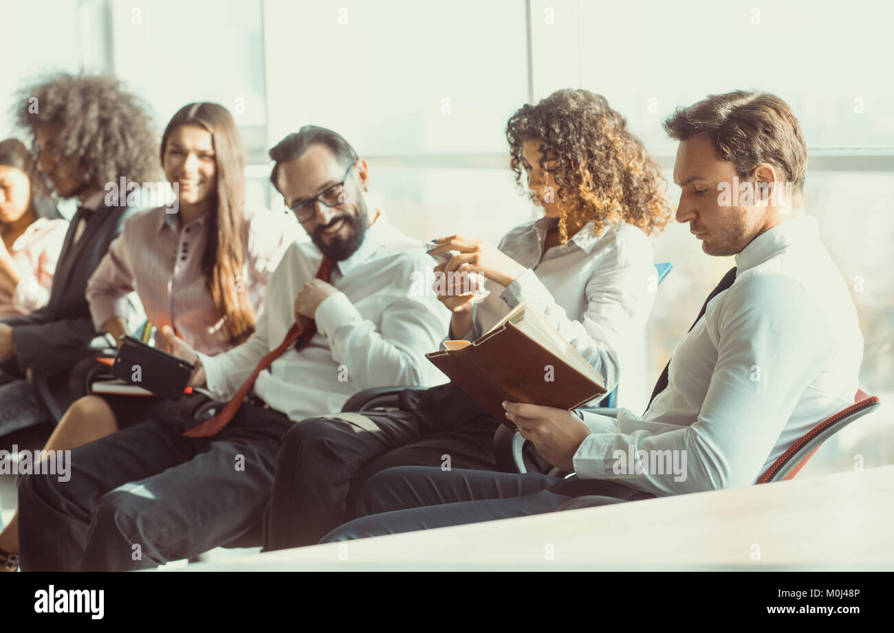 Busy office environment Stock Photo - Alamy