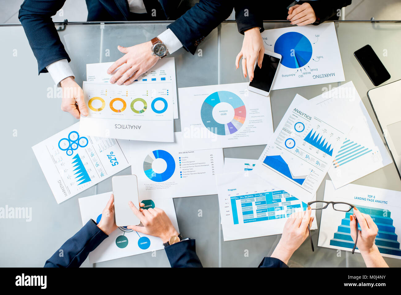 People working on business charts Stock Photo - Alamy