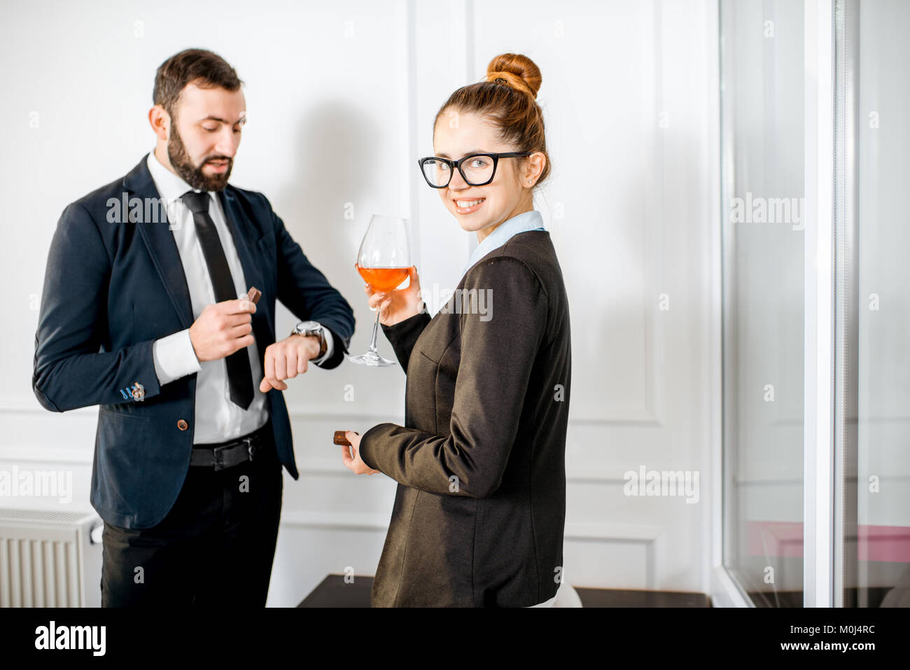 Couple during the business meeting Stock Photo - Alamy