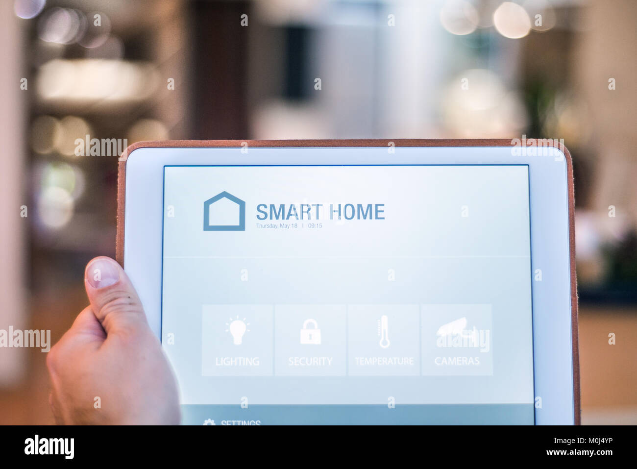 A tablet with smart home screen Stock Photo - Alamy